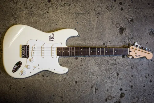 Enter To Win Guitar Signed By Dhani Harrison! | Easy Street Records